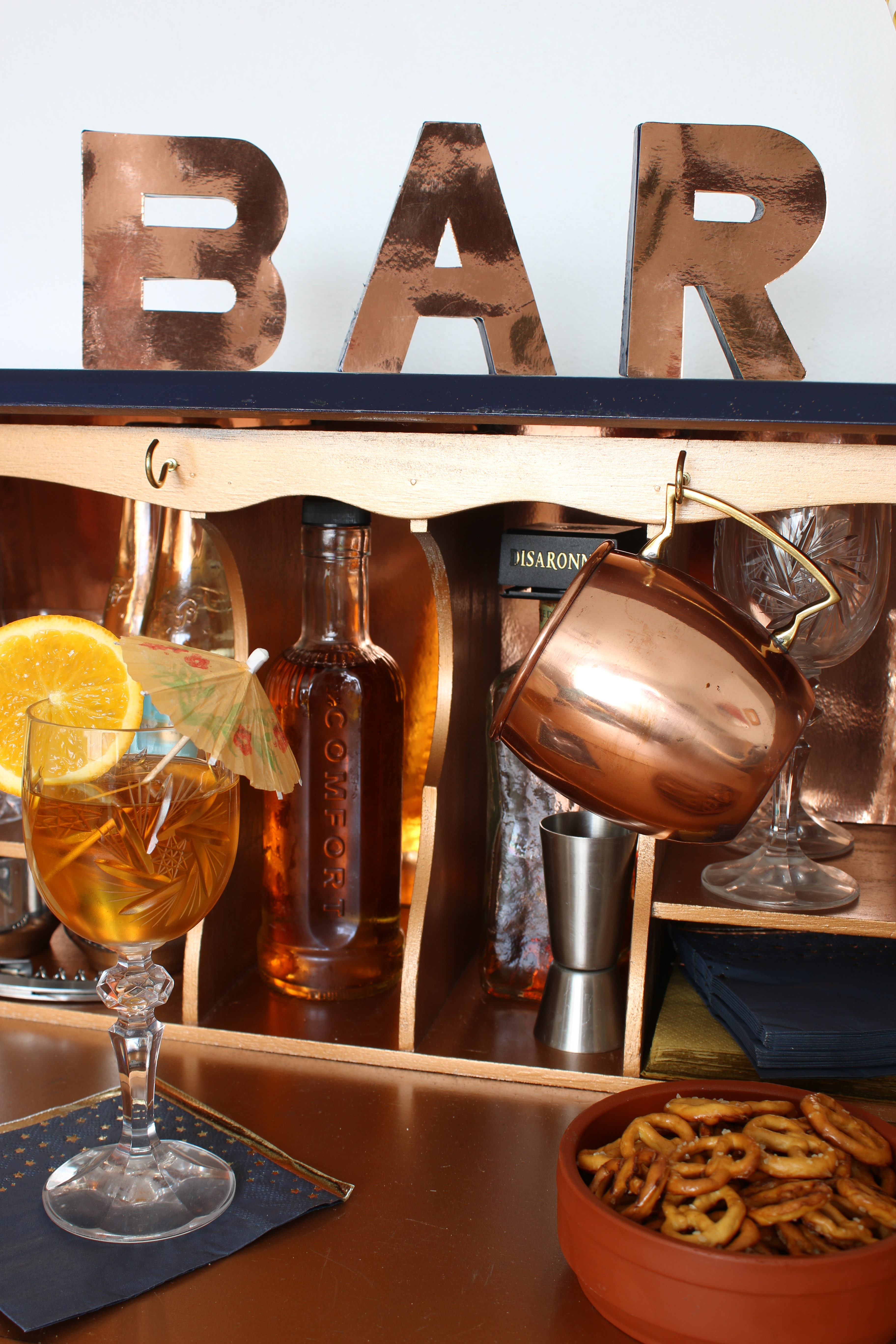 Upcycling a writing bureau into a cocktail cabinet for festive parties ...