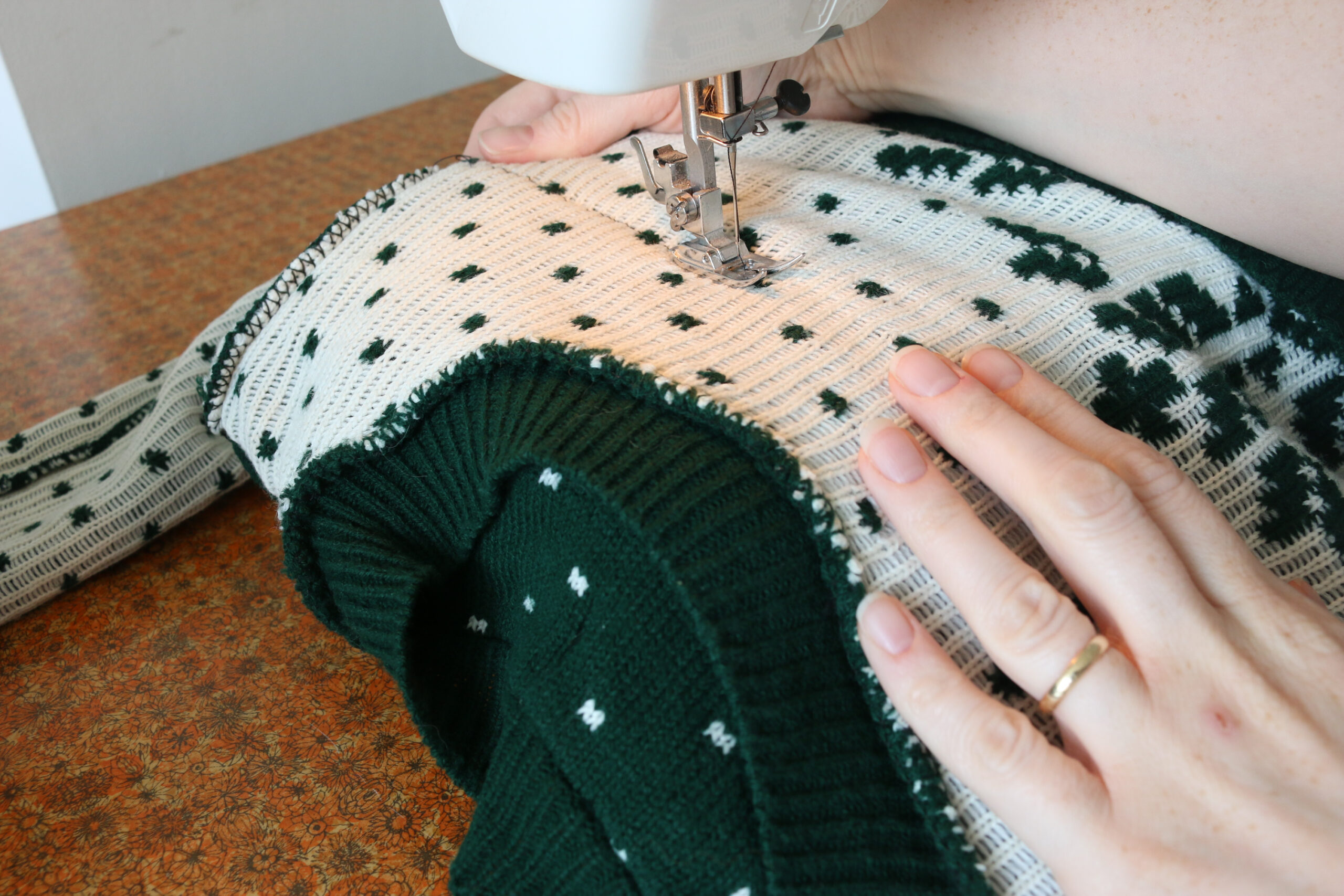 Easy sewing project to upcycle old Christmas jumpers into festive cushions