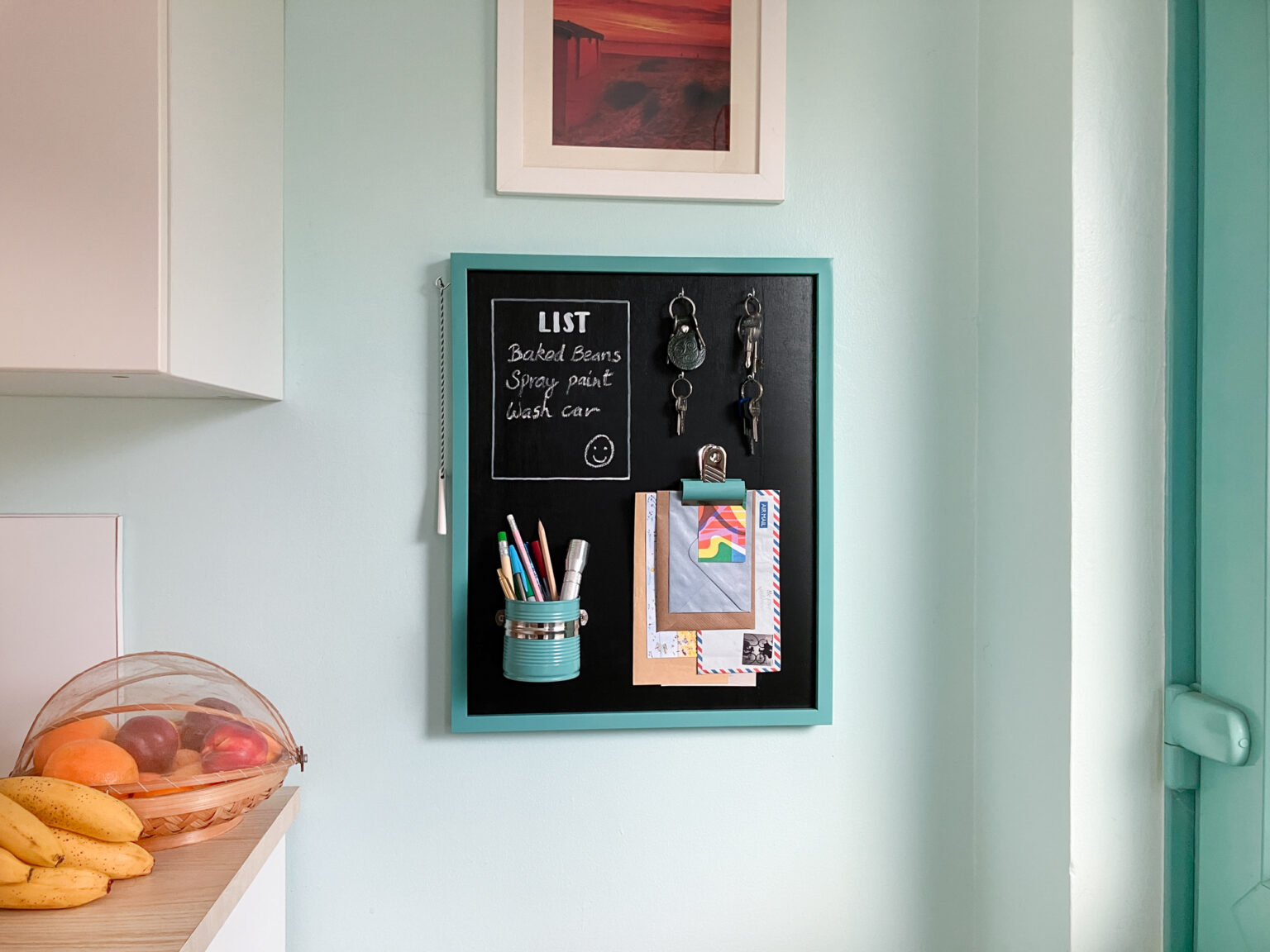 How to upcycle an old picture frame into a handy 'command centre'