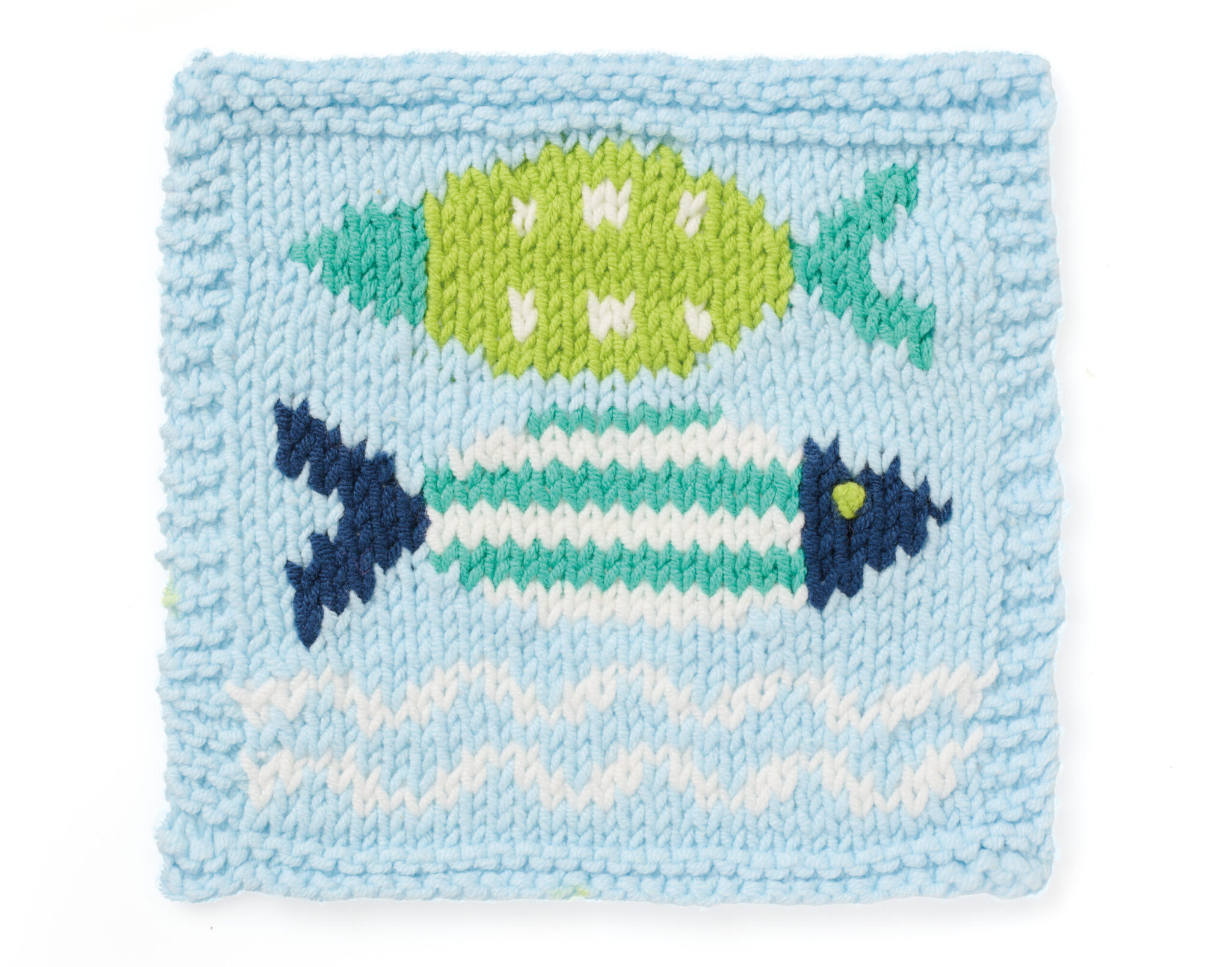 How to knit coastal-themed intarsia motifs: sailing boat, waves and fish